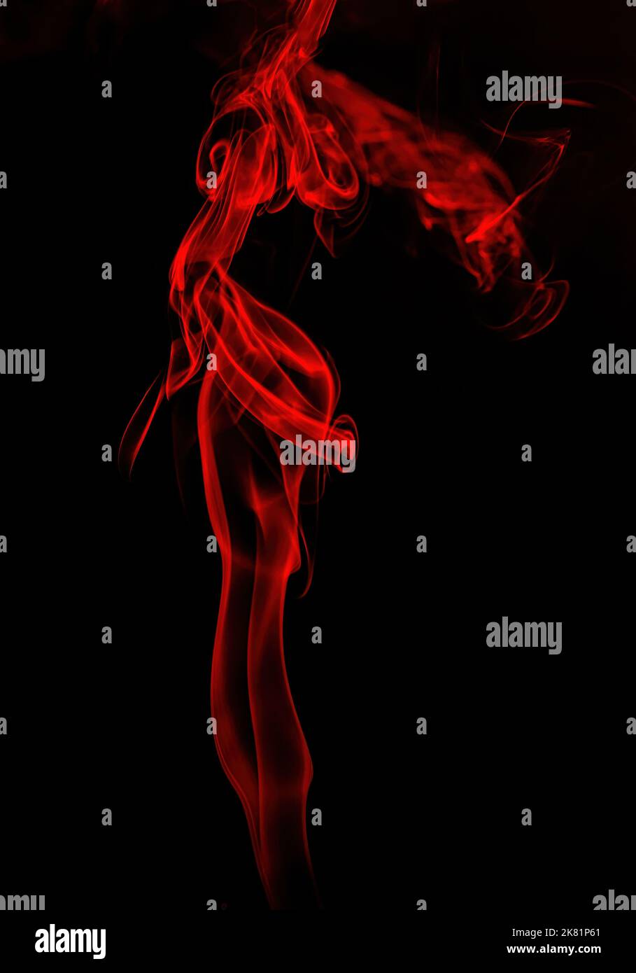 Smoke from incense stick isolated on a black background with some photo ...