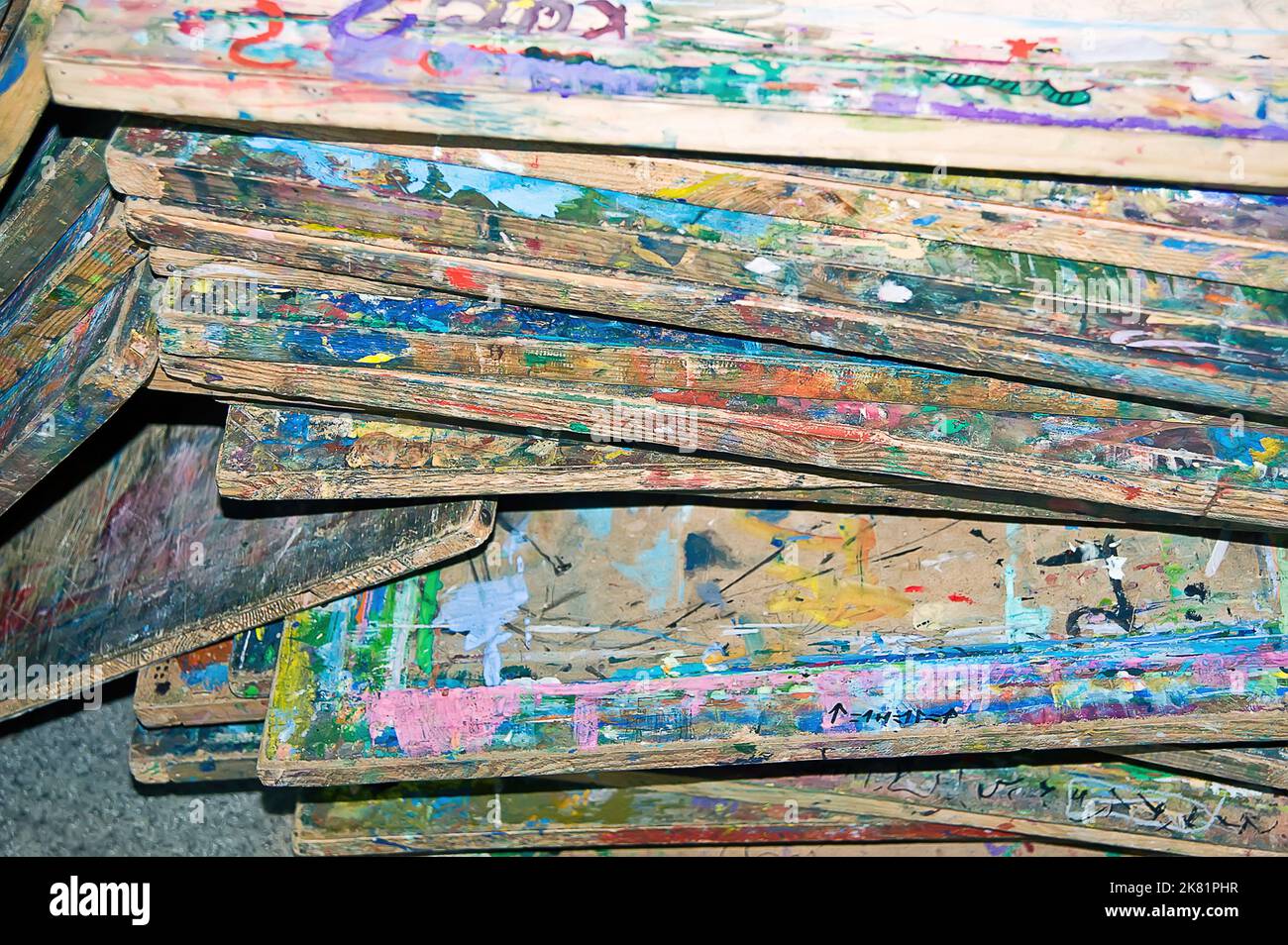 Stack of well used stained canvas stretcher bars for easel all in oil ...