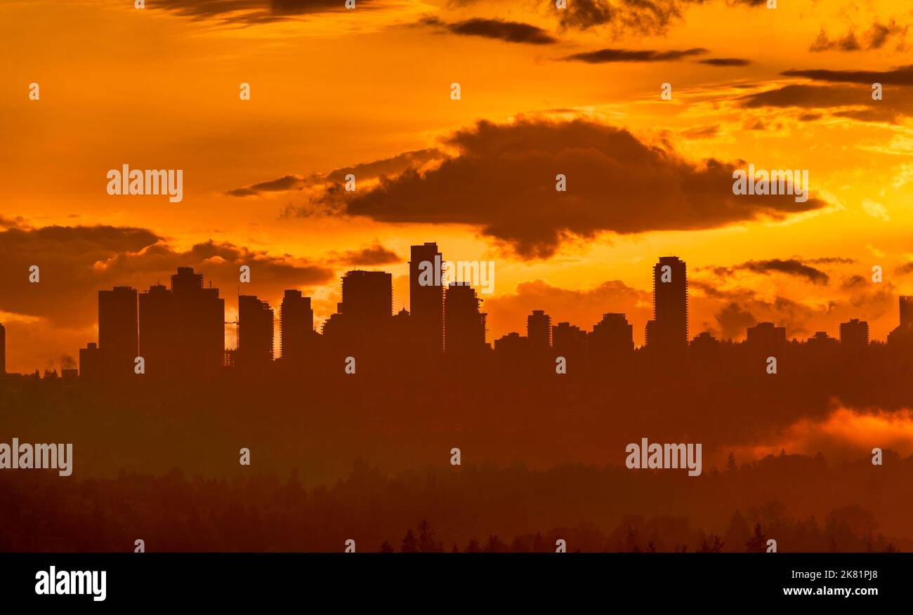 Urban cityscape silhouette on sunset sky background Stock Photo - Alamy