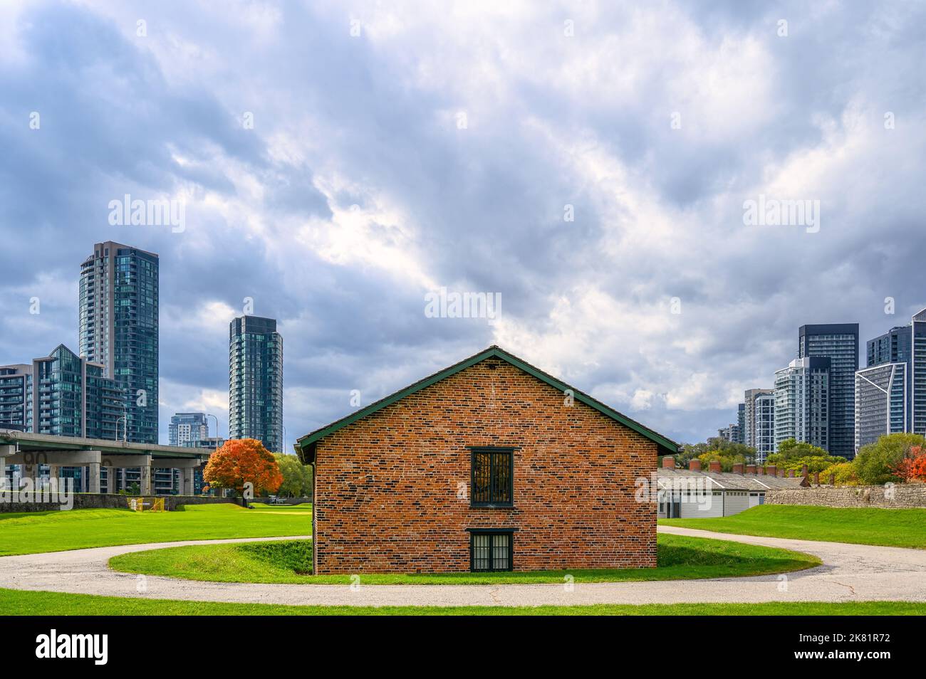 A colonial brick walls building exterior in a overcast weather day ...