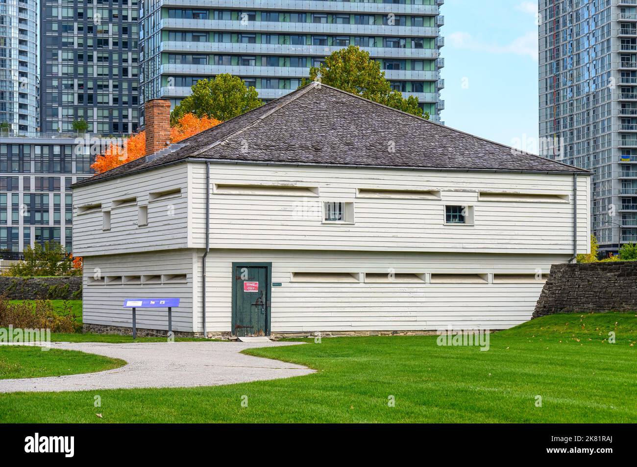 Colonial fortified wall buildings of the garrison contrast with the ...