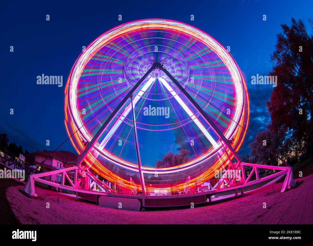 Ferris wheel go around at Lake Balaton at night Stock Photo - Alamy