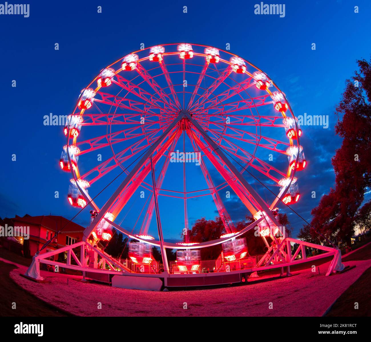 Ferris wheel go around at Lake Balaton at night Stock Photo - Alamy
