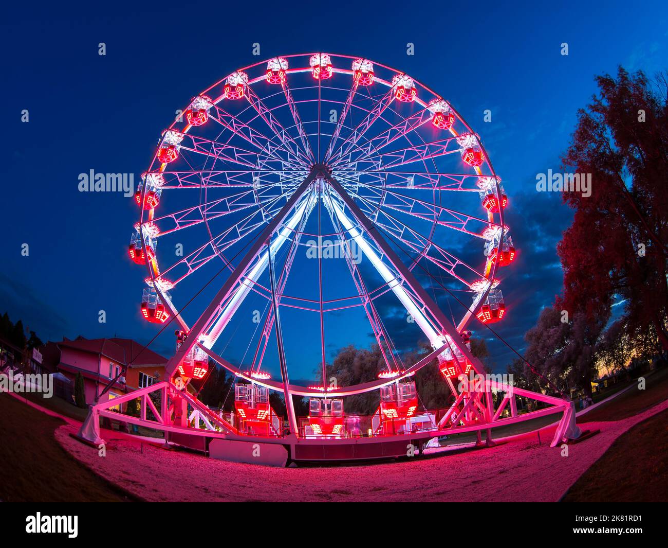 Ferris wheel go around at Lake Balaton at night Stock Photo - Alamy