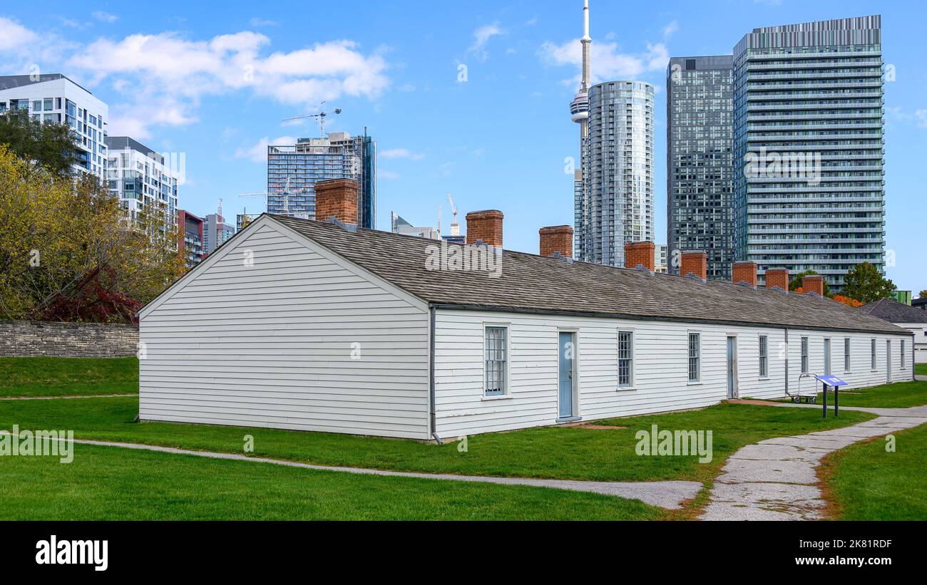 Colonial fortified wall buildings of the garrison contrast with the ...