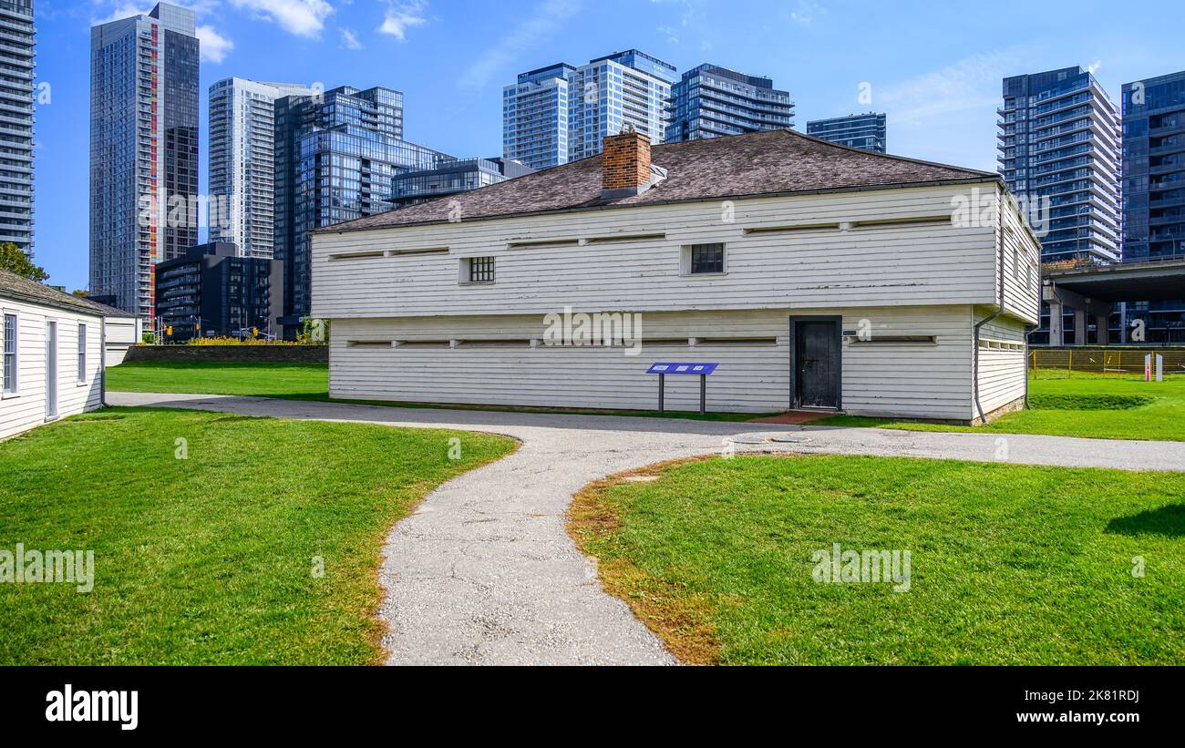 Colonial fortified wall buildings of the garrison contrast with the ...
