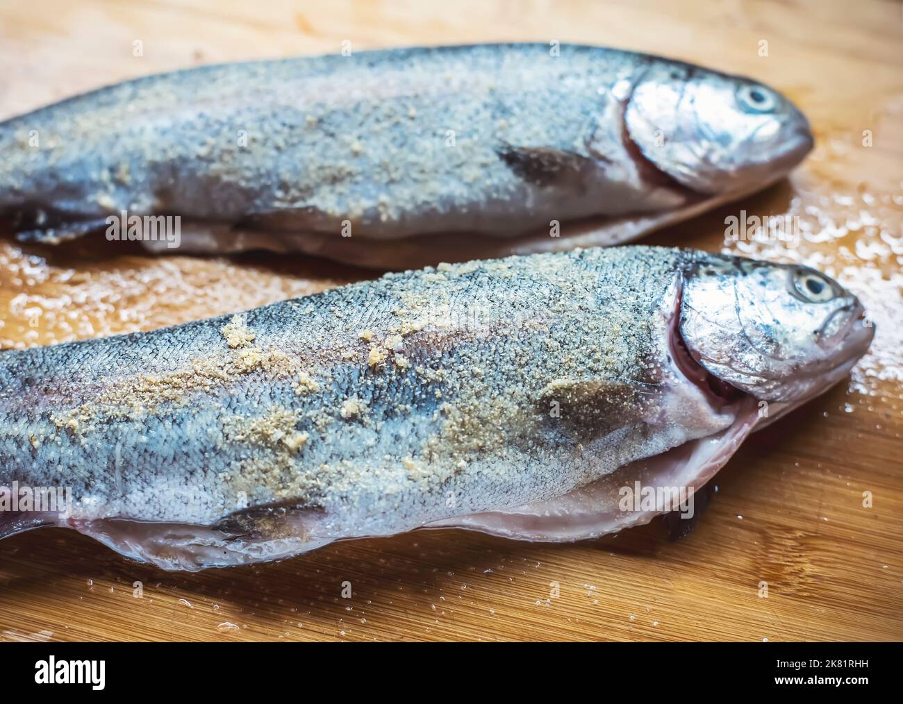 Raw hake fillet on plate hi-res stock photography and images - Alamy