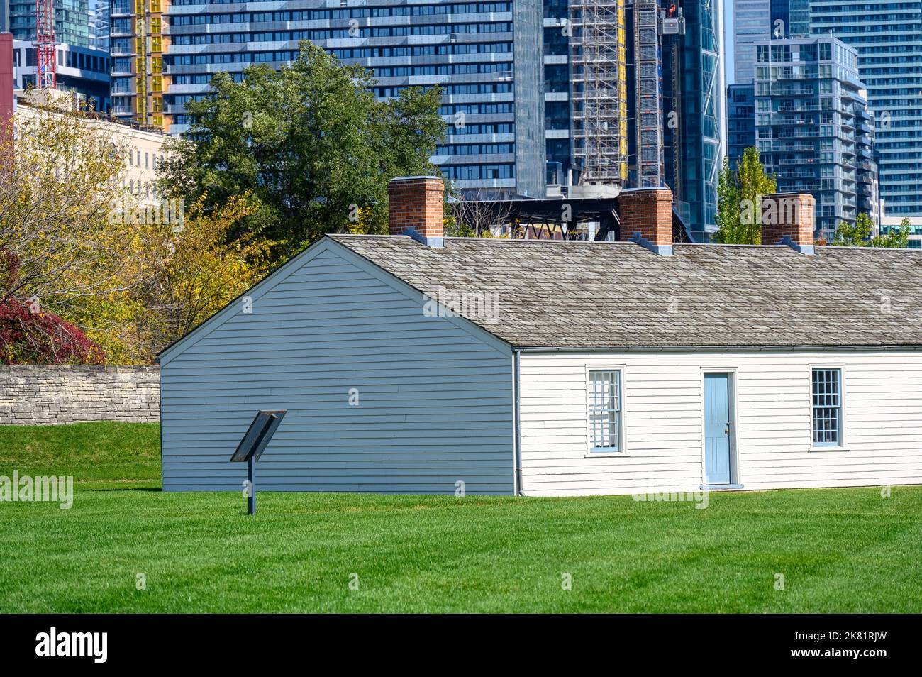 Wood walls low-rise colonial building exterior in the garrison yard ...