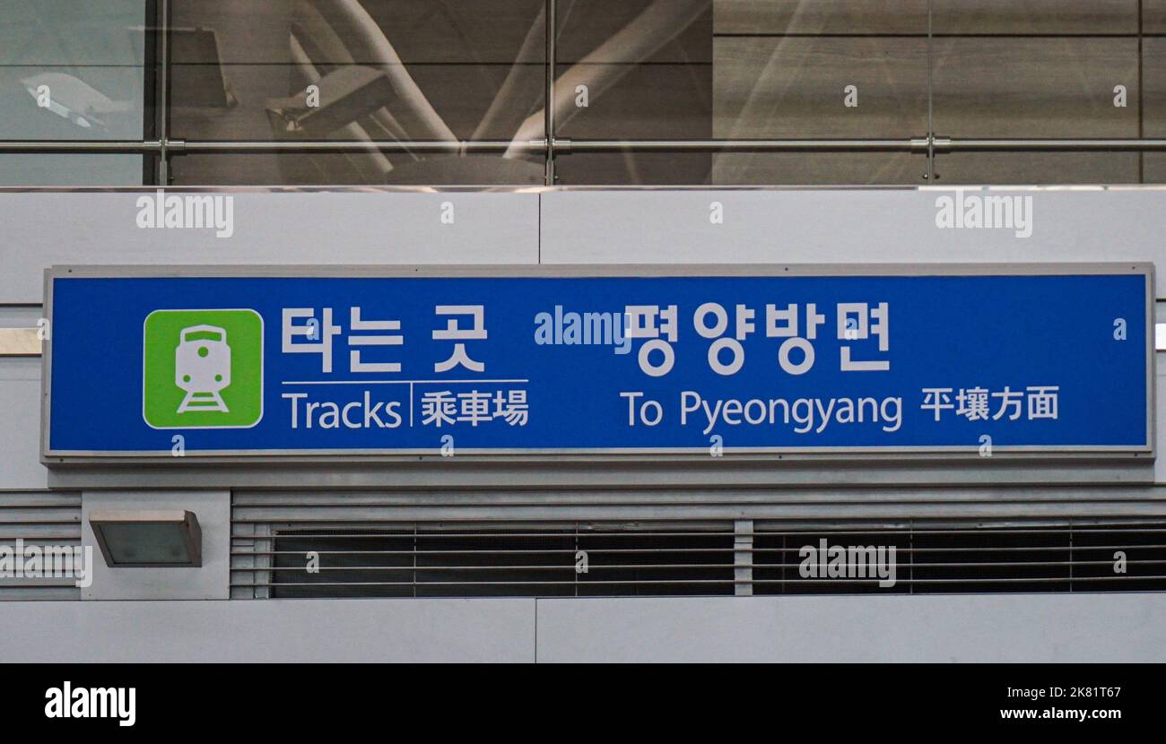 A direction sign indicating the railway platform to Pyongyang at ...