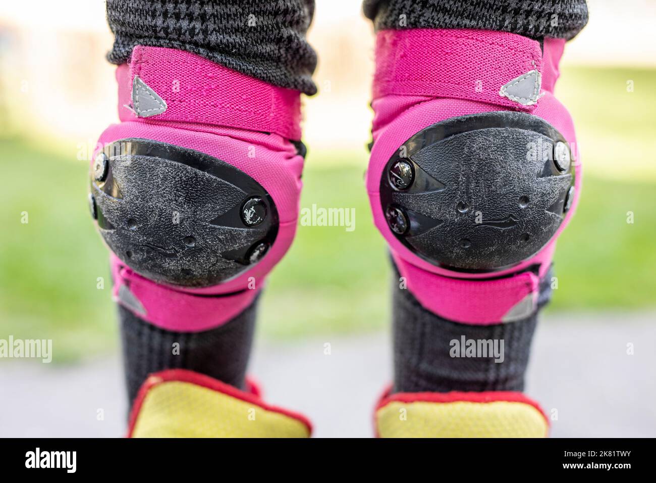 Protectors on teenage girl skateboard knee Stock Photo - Alamy