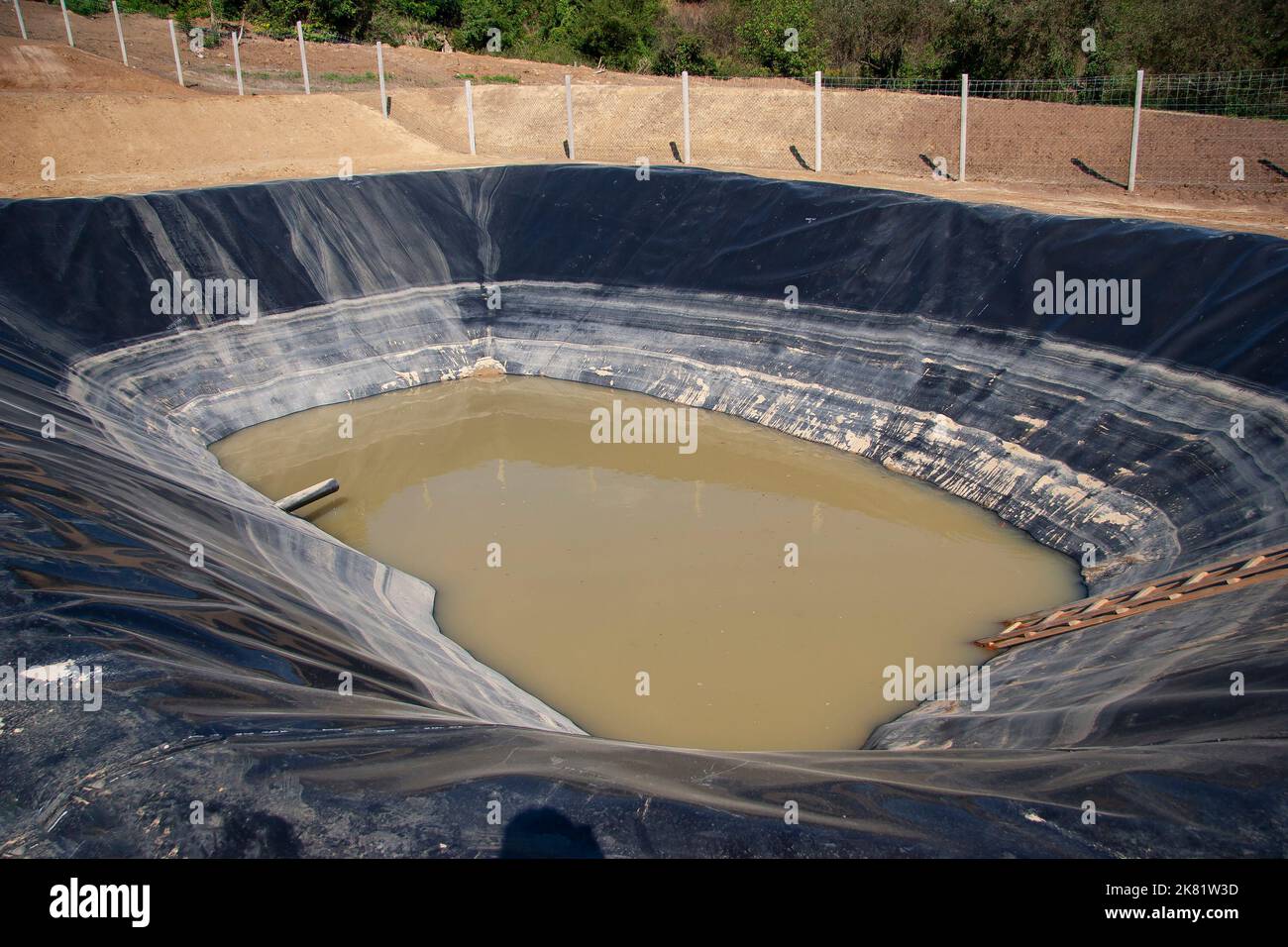 Insulated leachate pond with dirty water, part of landfill Stock Photo ...