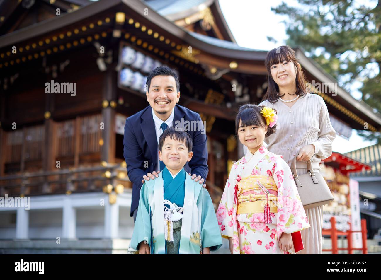 Japanese family at the temple Stock Photo - Alamy