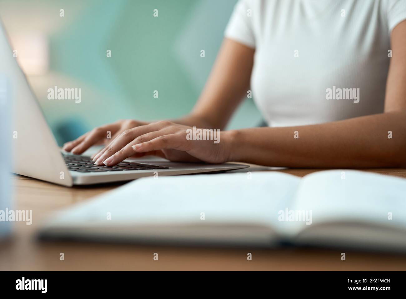 Keeping track of the agenda for today. an unrecognizable woman using a ... Keeping track of the agenda for today. an unrecognizable woman using a ...