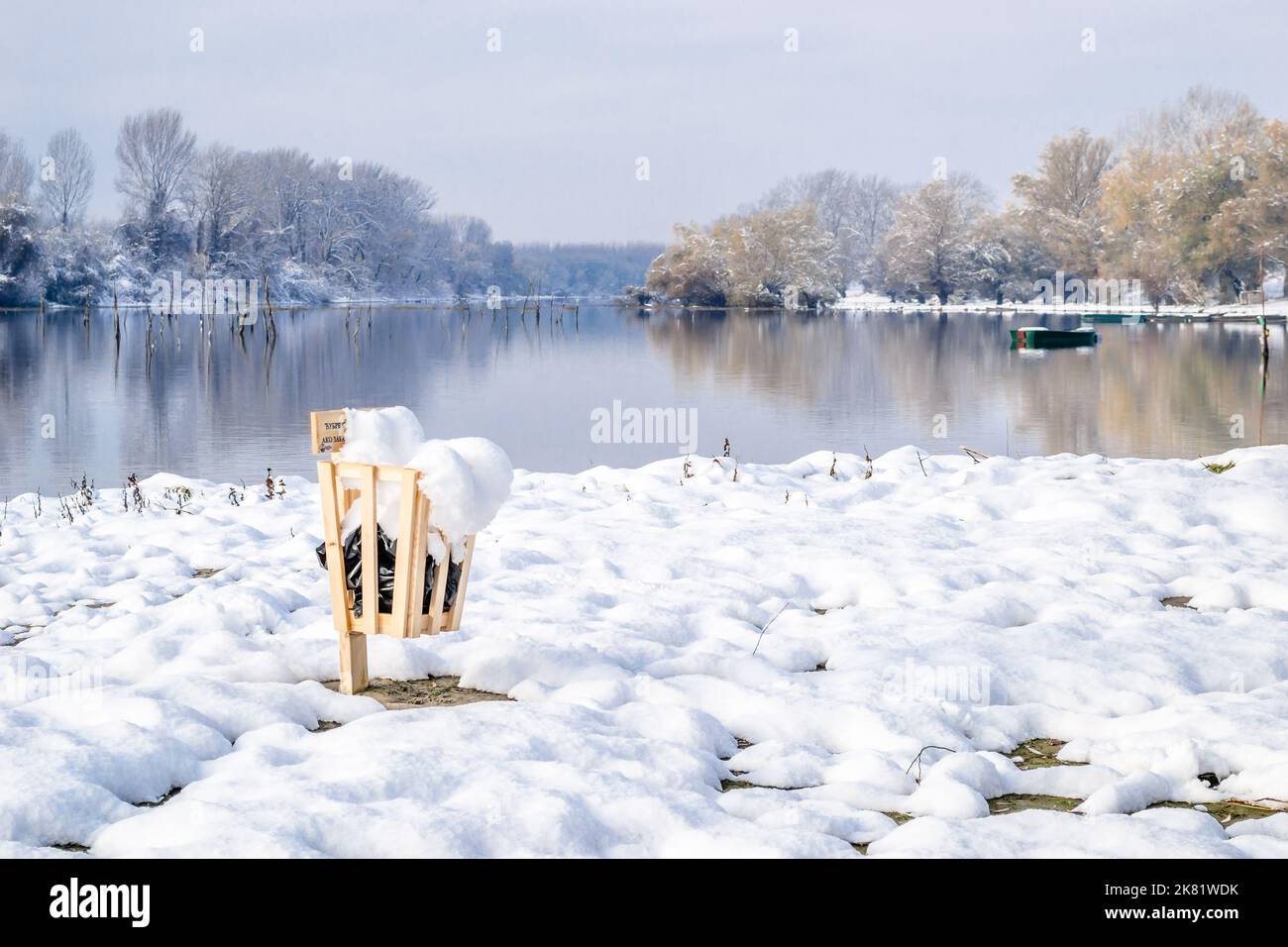 Marsh lake in winter covered with snow. Winter landscape of a marshy ...