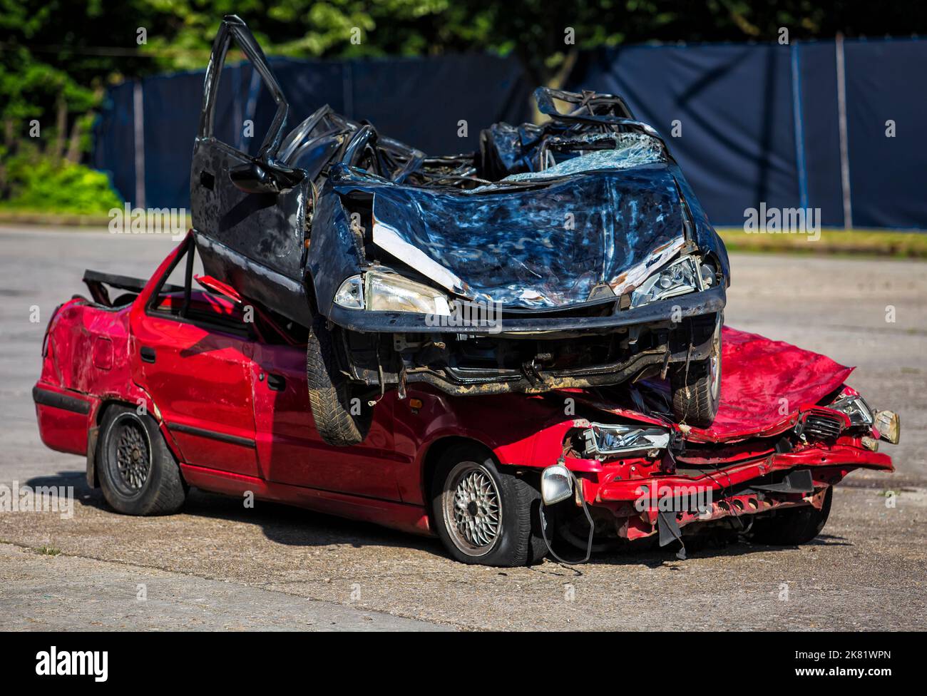 Two wrecked car on each other Stock Photo - Alamy