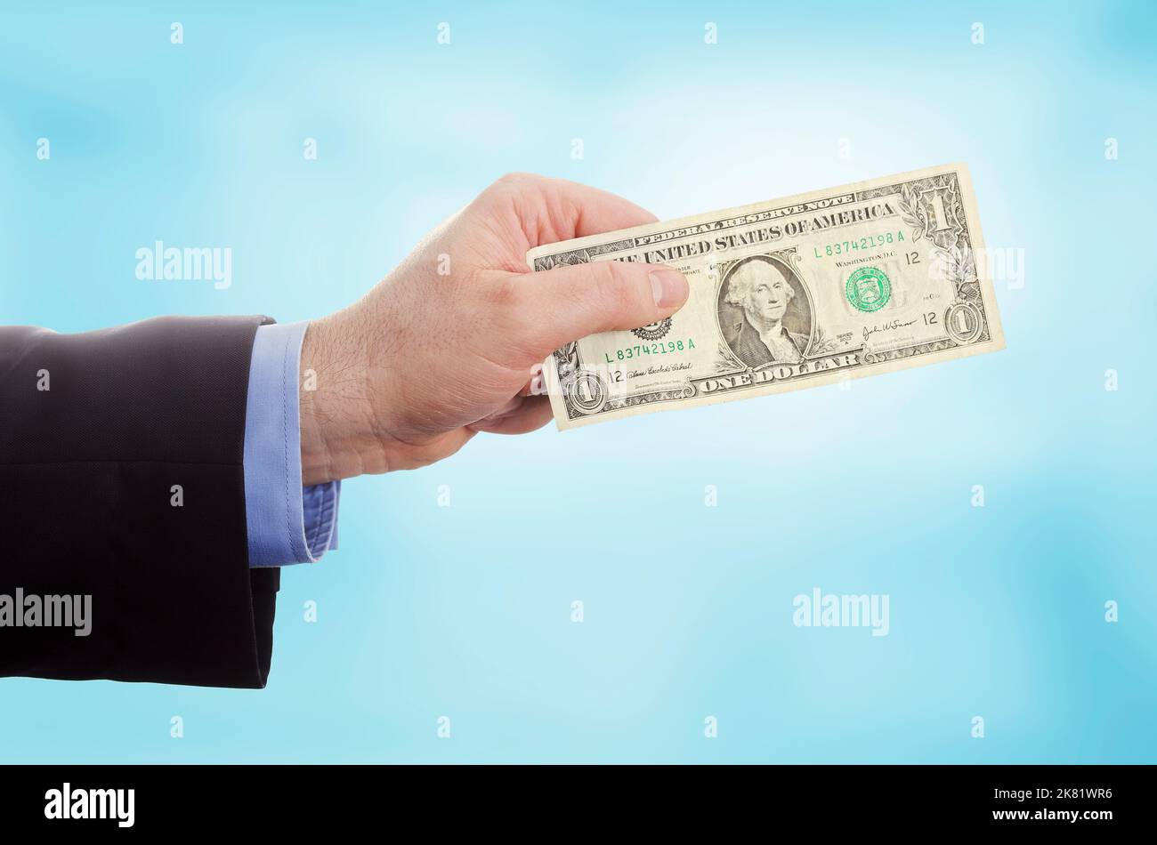 Hand money over hi-res stock photography and images - Alamy