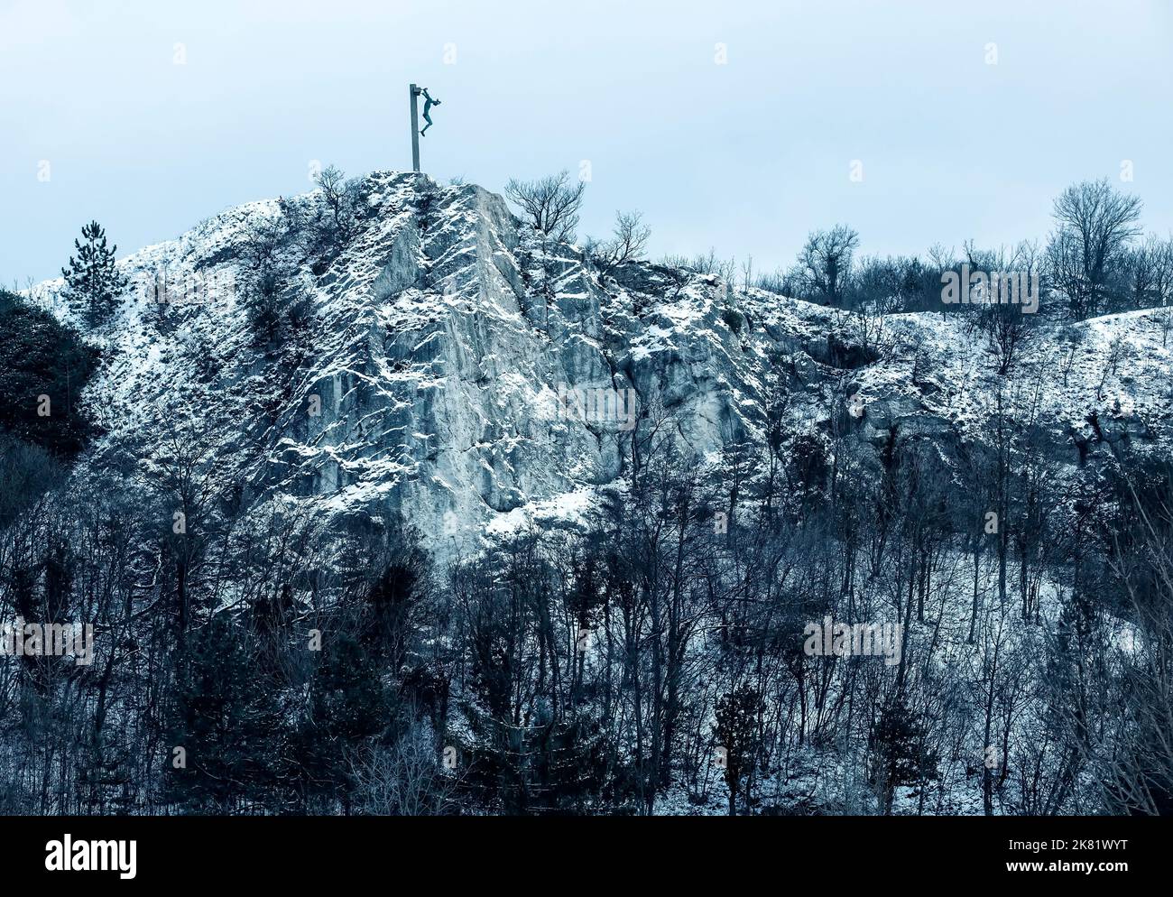 Rock formation with crucifix in Pecs, Hungary Stock Photo - Alamy