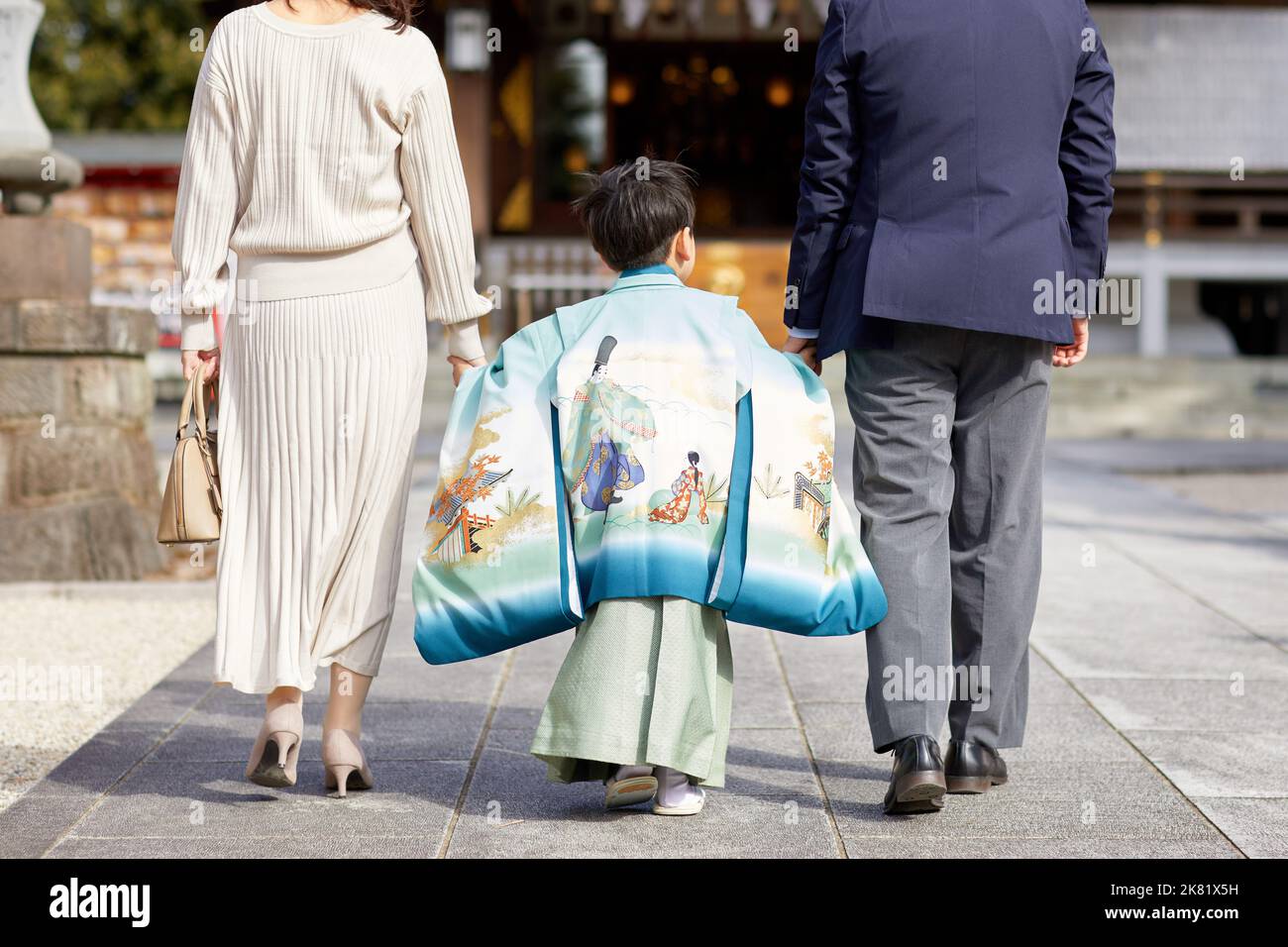 Japanese family at the temple Stock Photo - Alamy