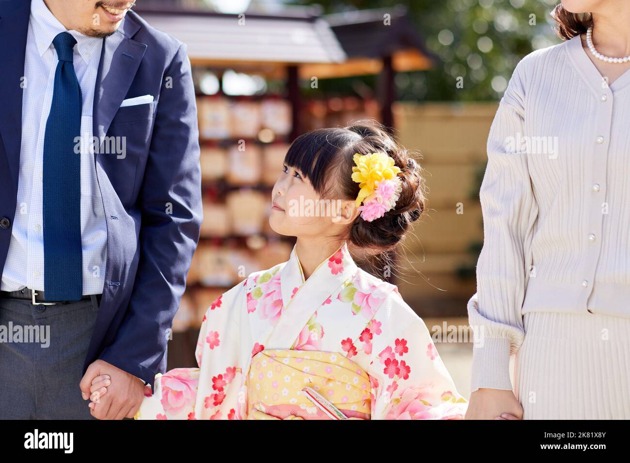 Japanese family at the temple Stock Photo - Alamy