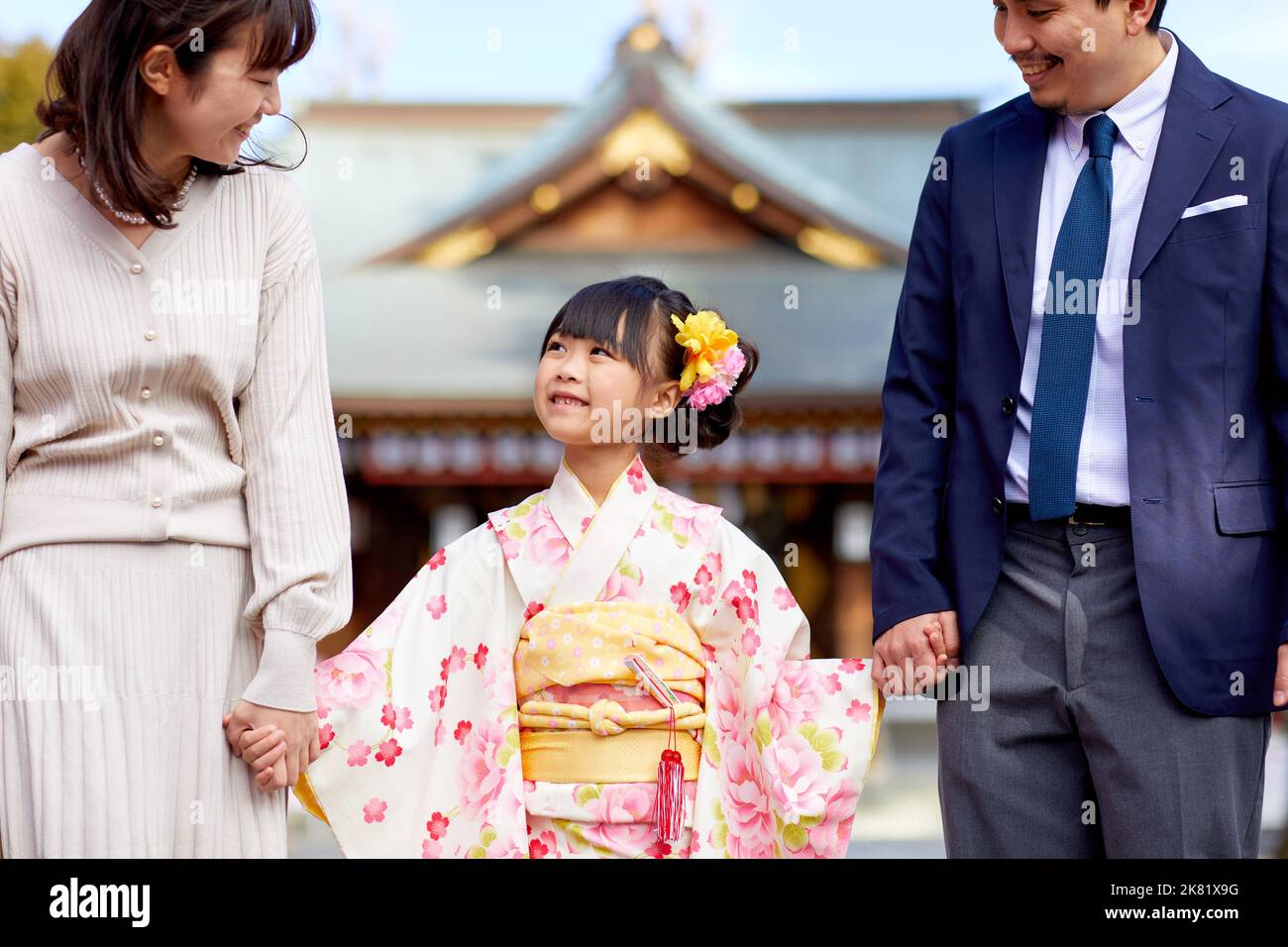 Japanese family at the temple Stock Photo - Alamy