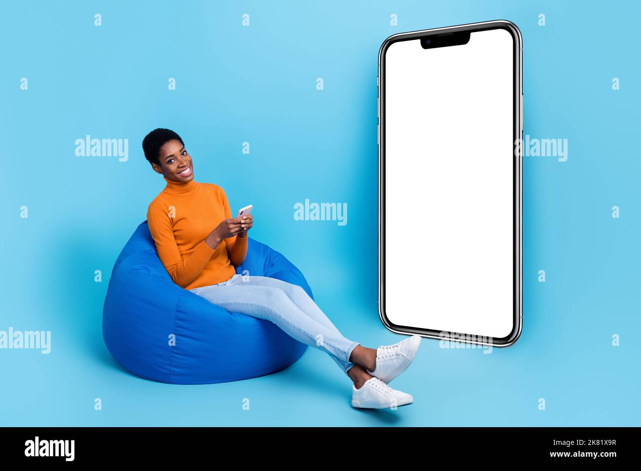 Full size photo of trans male in unisex turtleneck sit armchair surfing ...