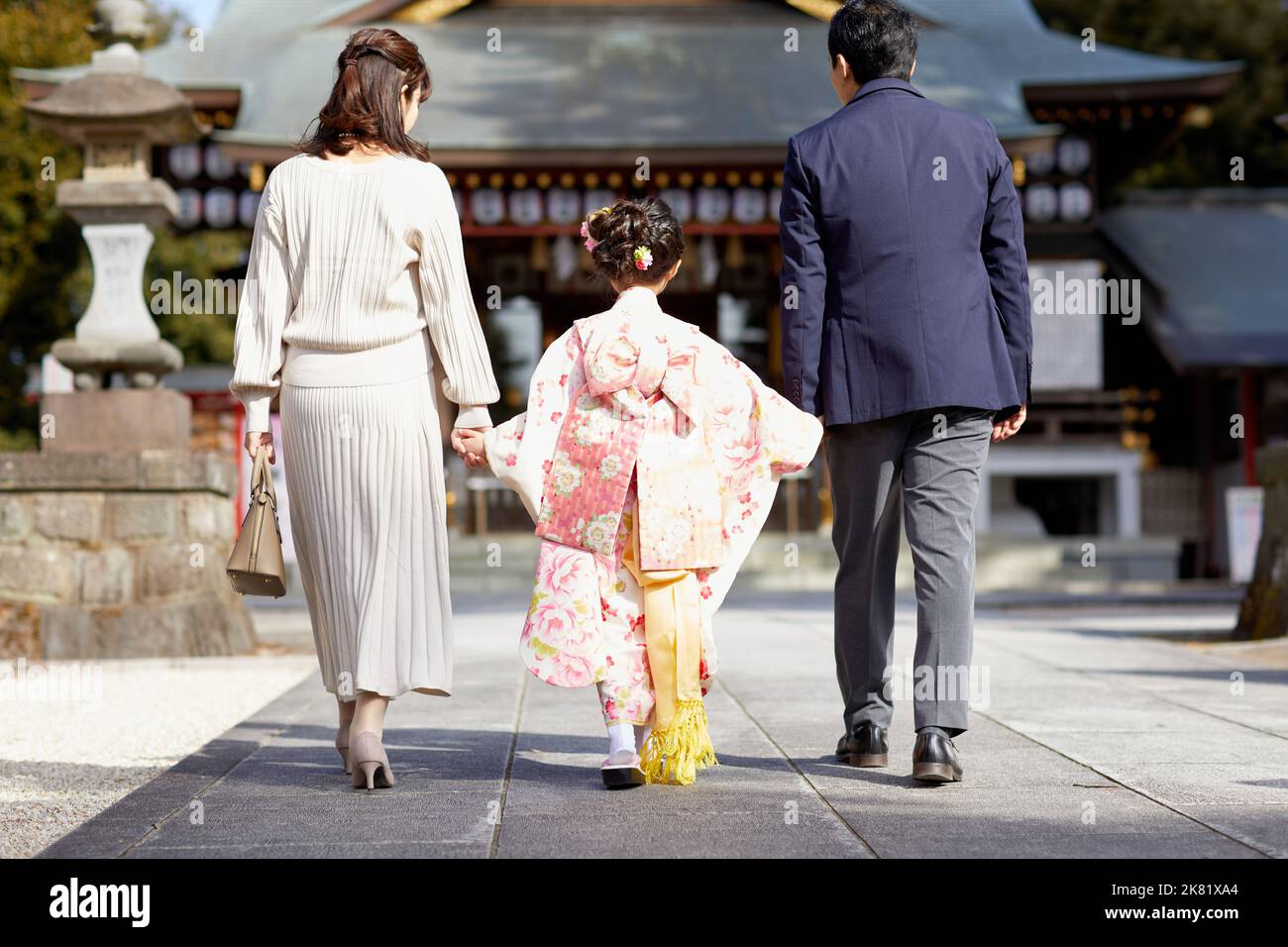 Japanese family at the temple Stock Photo - Alamy