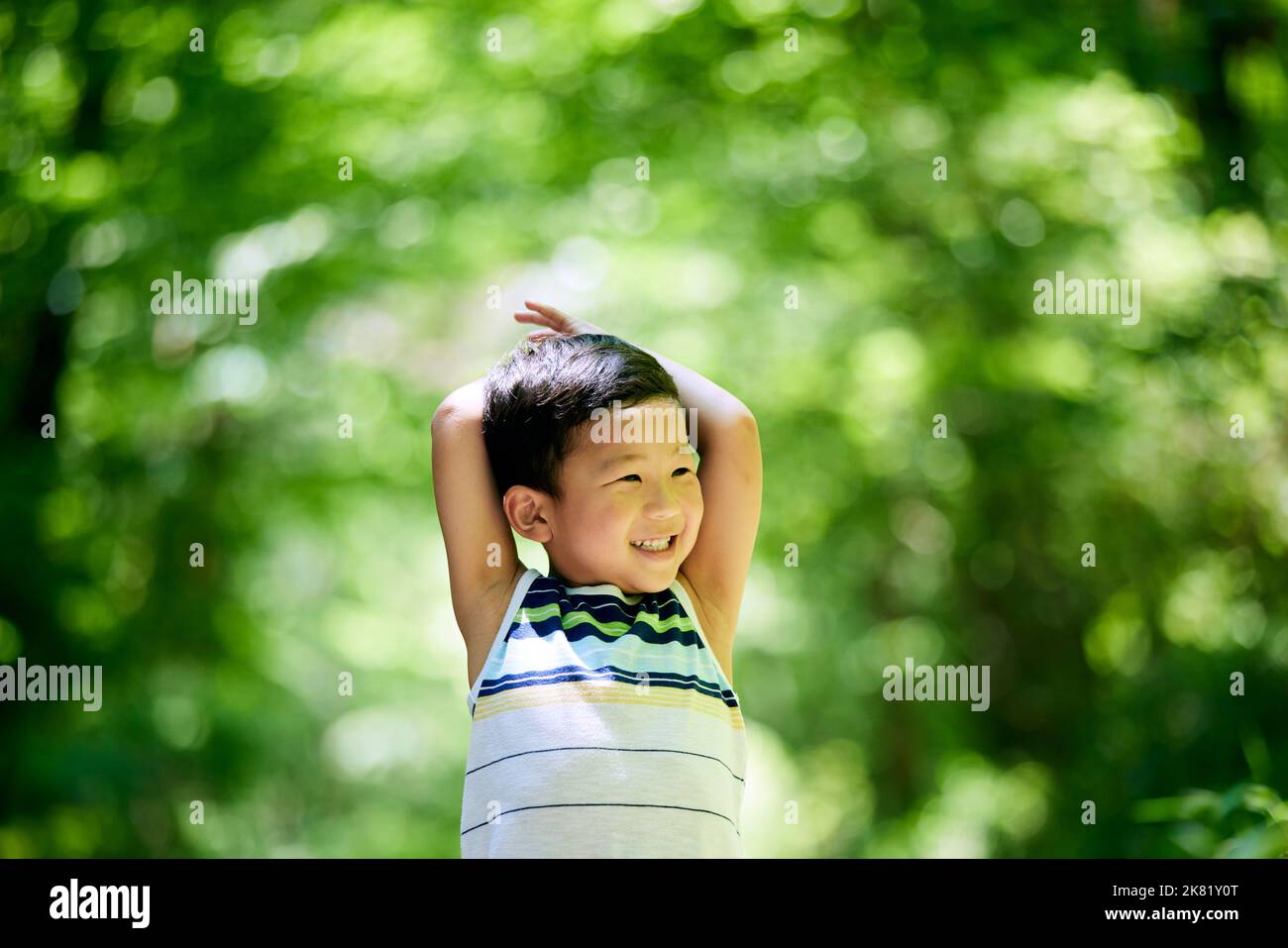 Japanese kid in a city park Stock Photo - Alamy