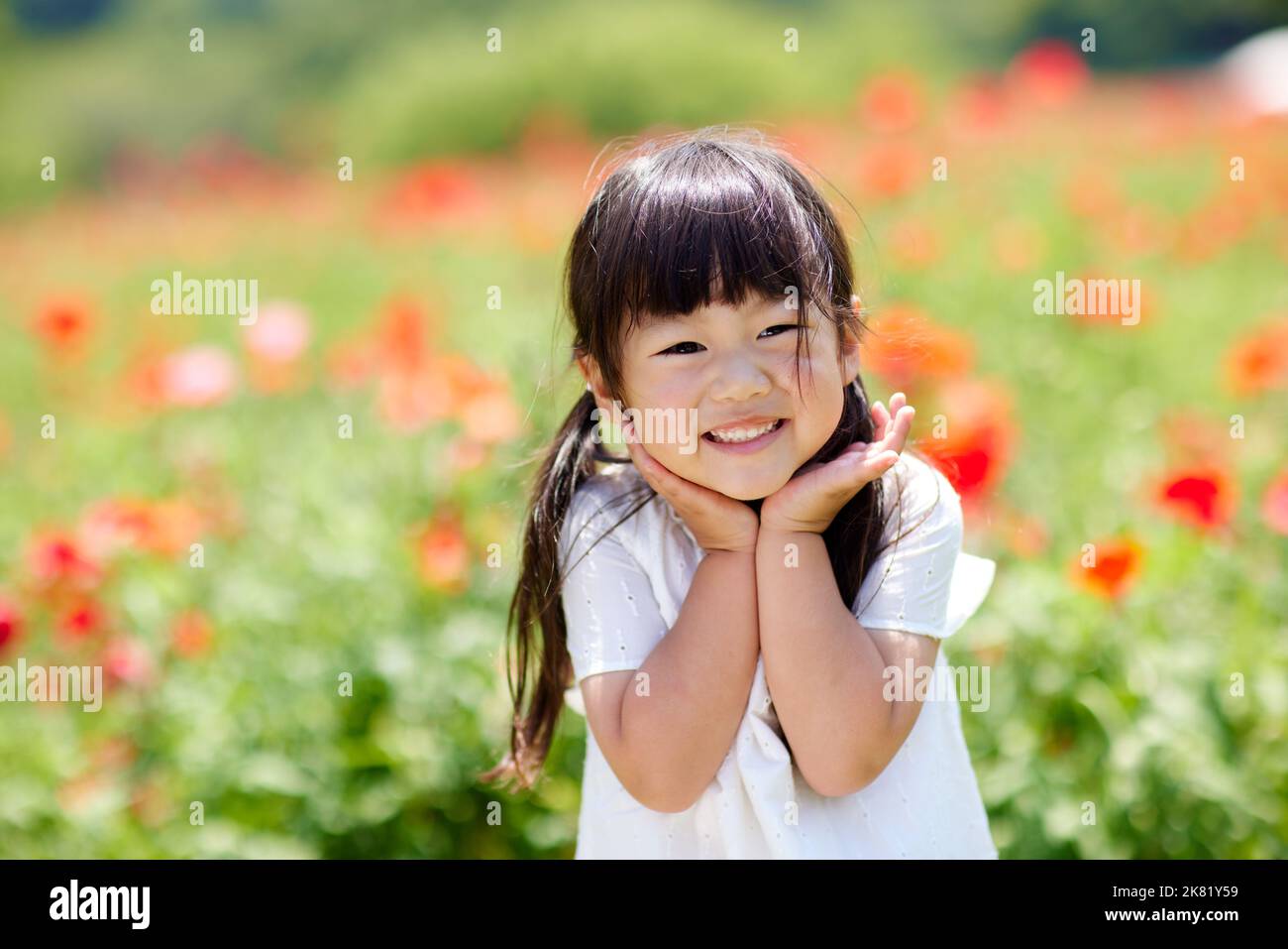 Japanese kid in a city park Stock Photo - Alamy