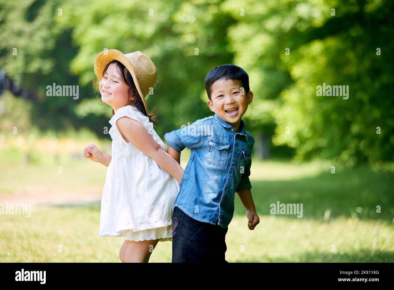 Japanese kids in a city park Stock Photo - Alamy