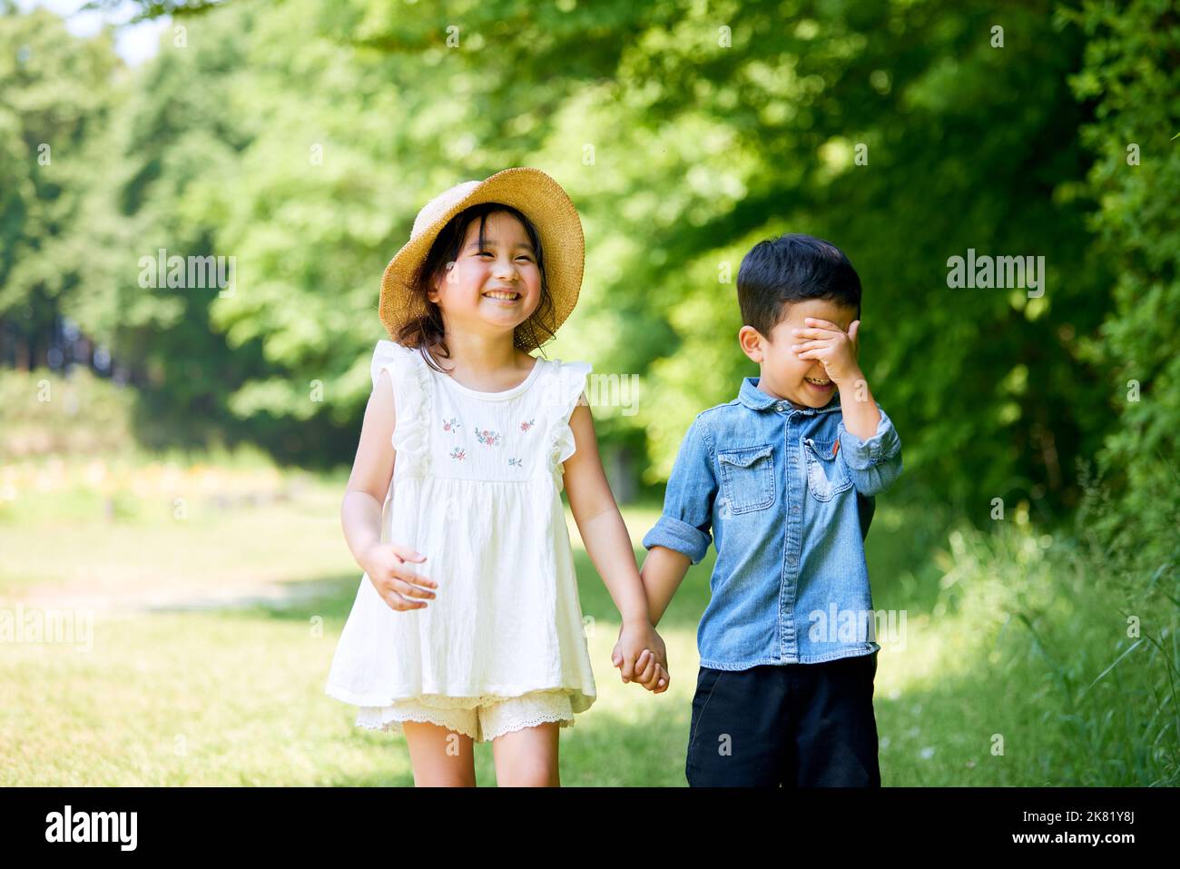 Japanese kids in a city park Stock Photo - Alamy