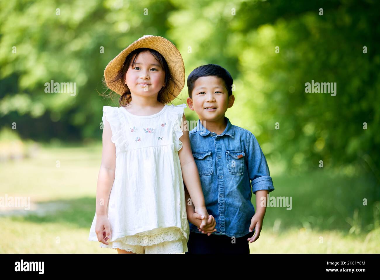 Japanese kids in a city park Stock Photo - Alamy