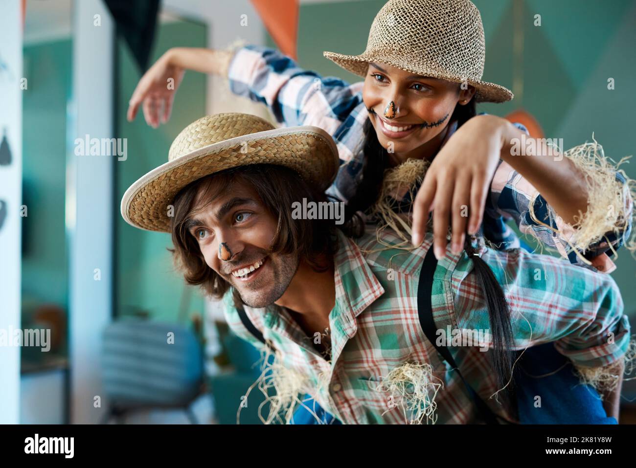 Were the boo crew. a young couple dressed in halloween costumes being ...