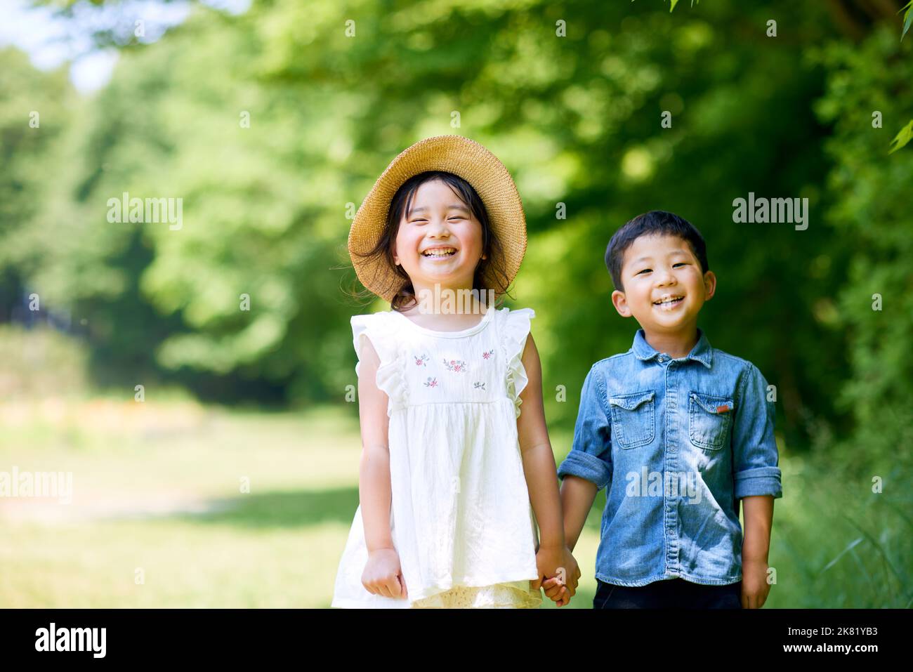 Japanese kids in a city park Stock Photo - Alamy