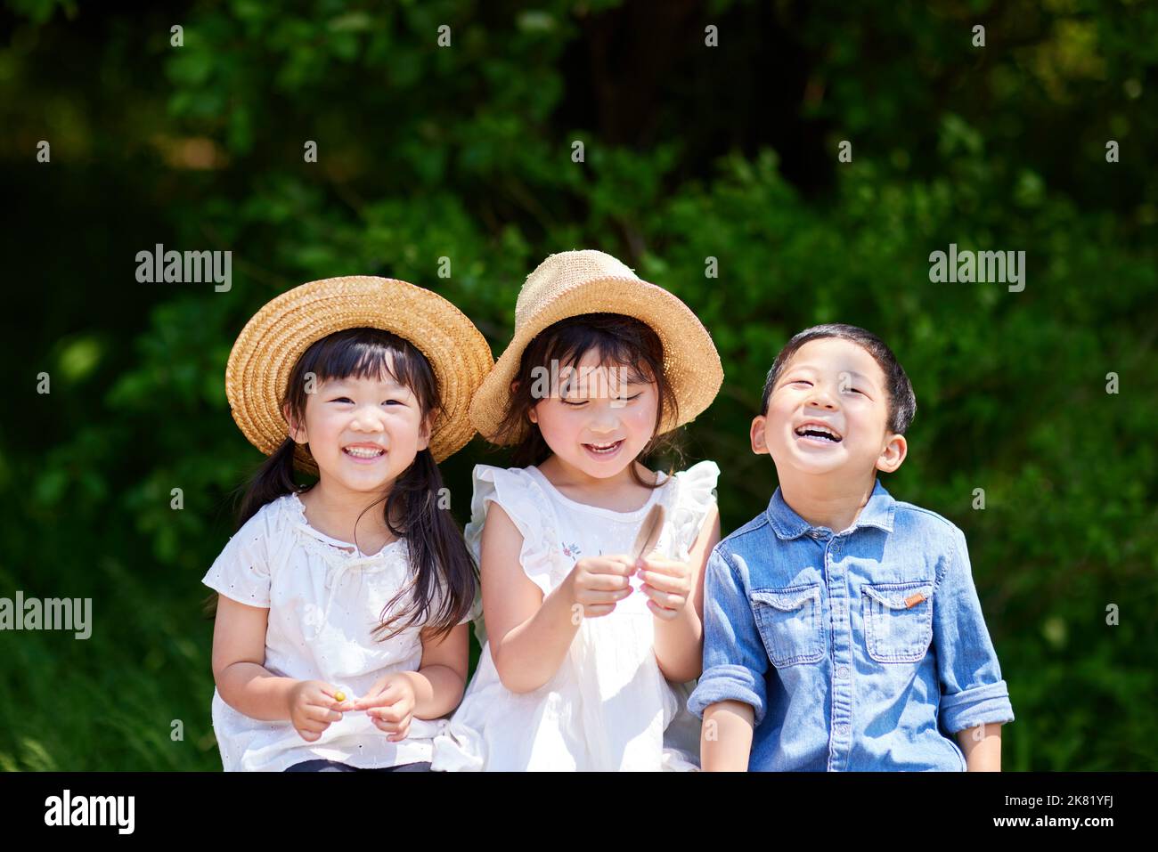 Japanese kids in a city park Stock Photo - Alamy
