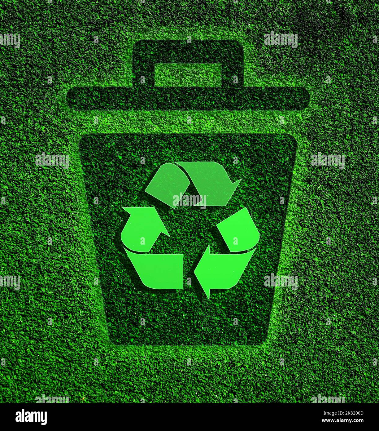 Recycling sign with dustbin on green background Stock Photo - Alamy