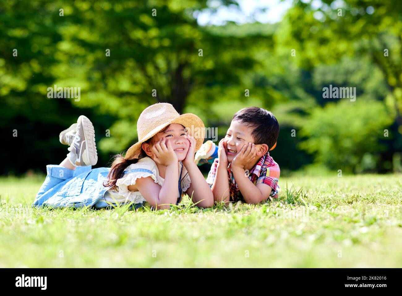 Japanese kids in a city park Stock Photo - Alamy