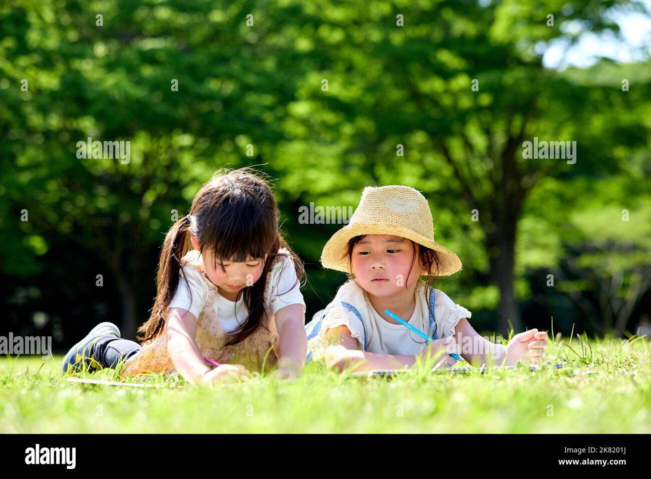 Japanese kids in a city park Stock Photo - Alamy