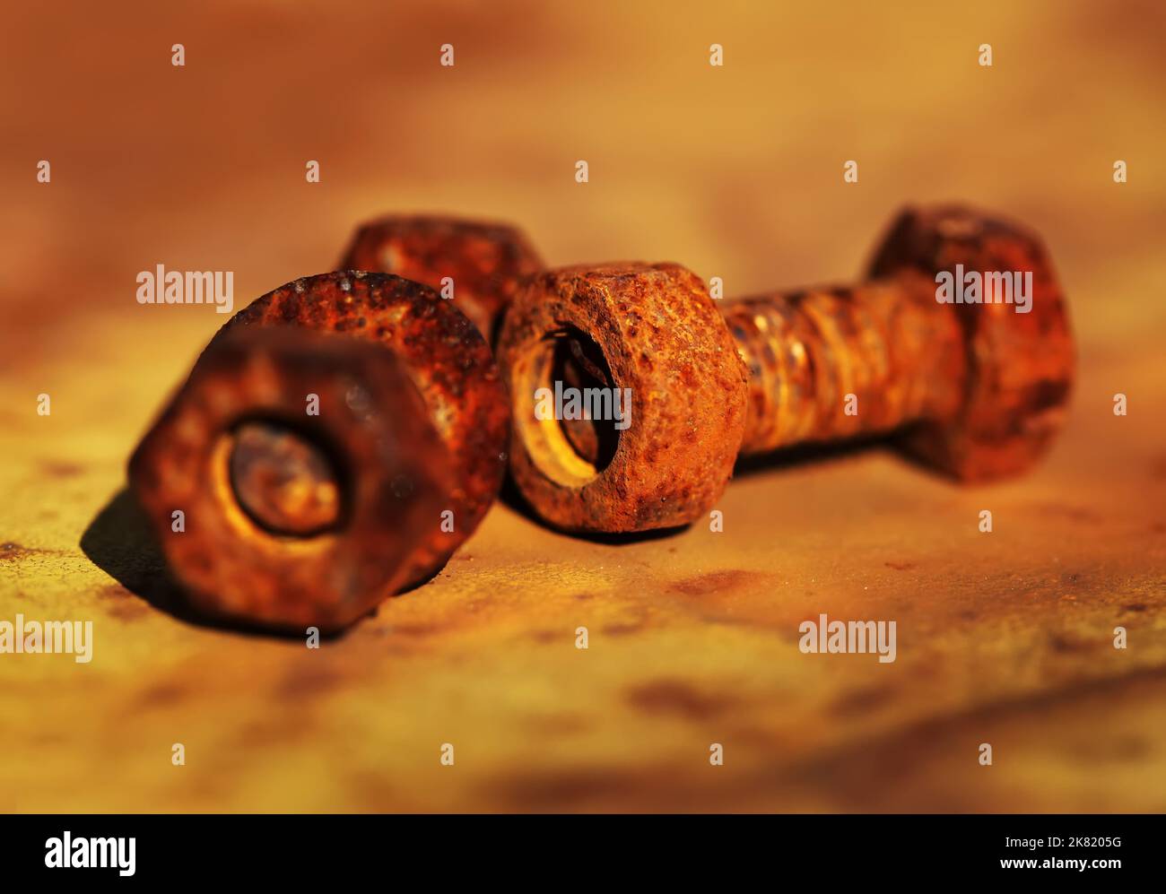 Macro photo of rusted screw on rusty metal plate Stock Photo - Alamy