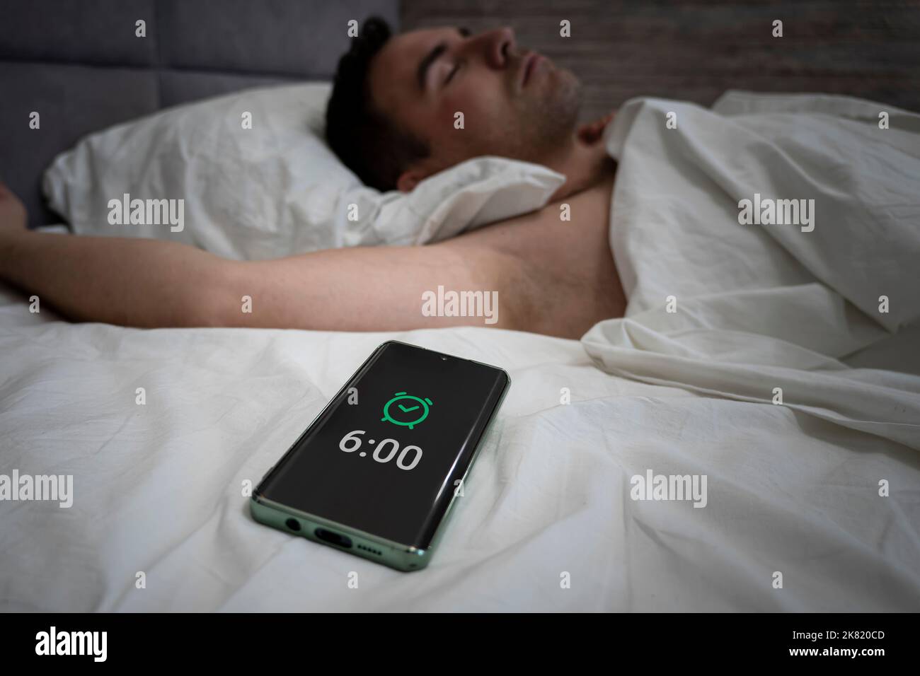 Man lying on a bed in a hotel room hi-res stock photography and images ...