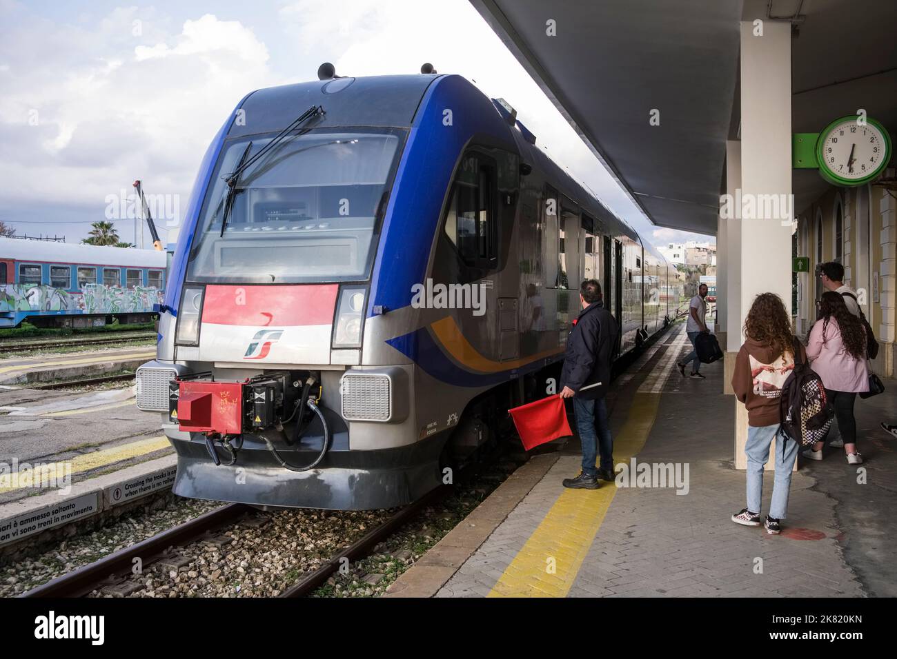 Italy, region of Apulia: Gallipoli; Trenitalia train alongside a ...
