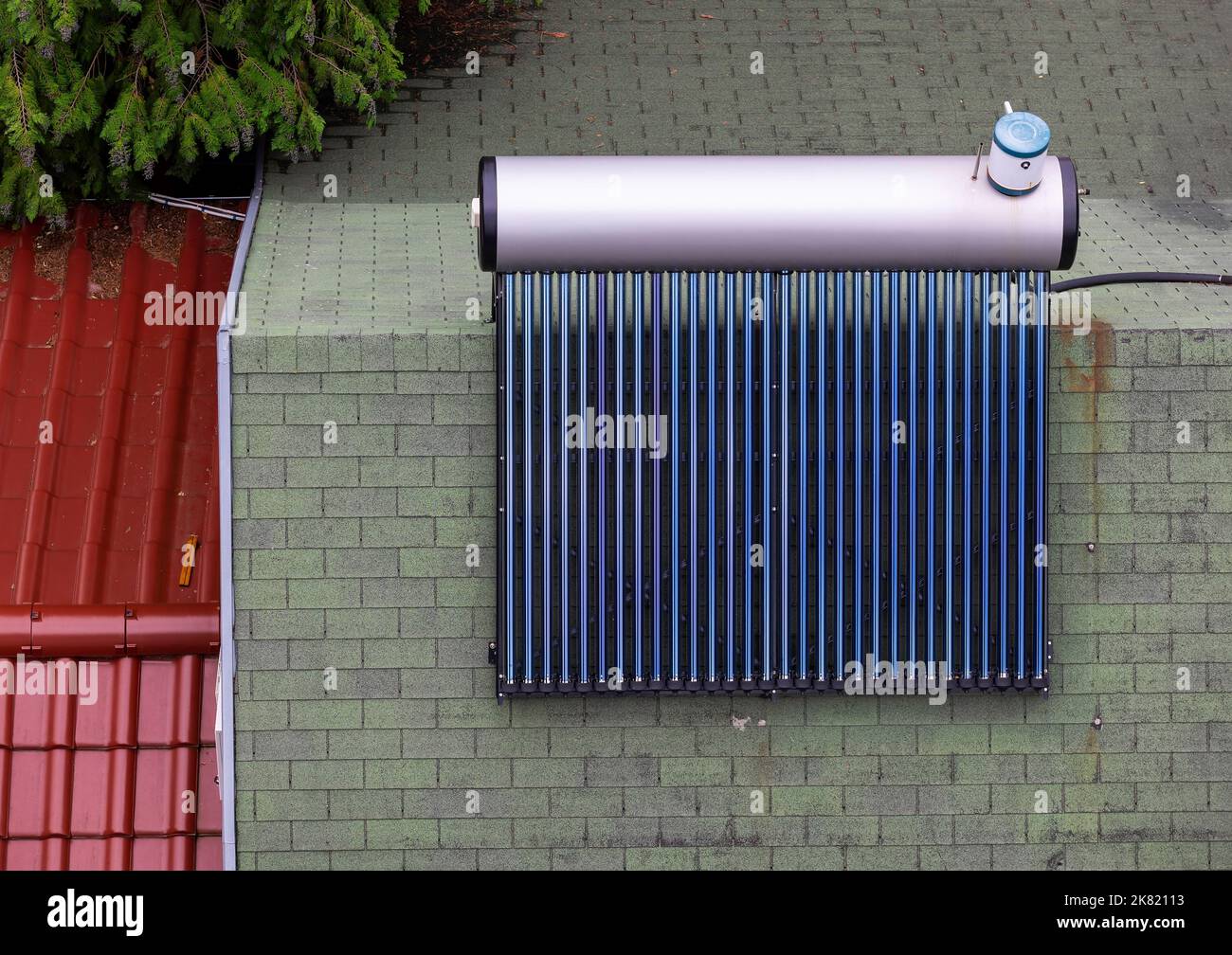 Sun collector panel on house roof Stock Photo - Alamy