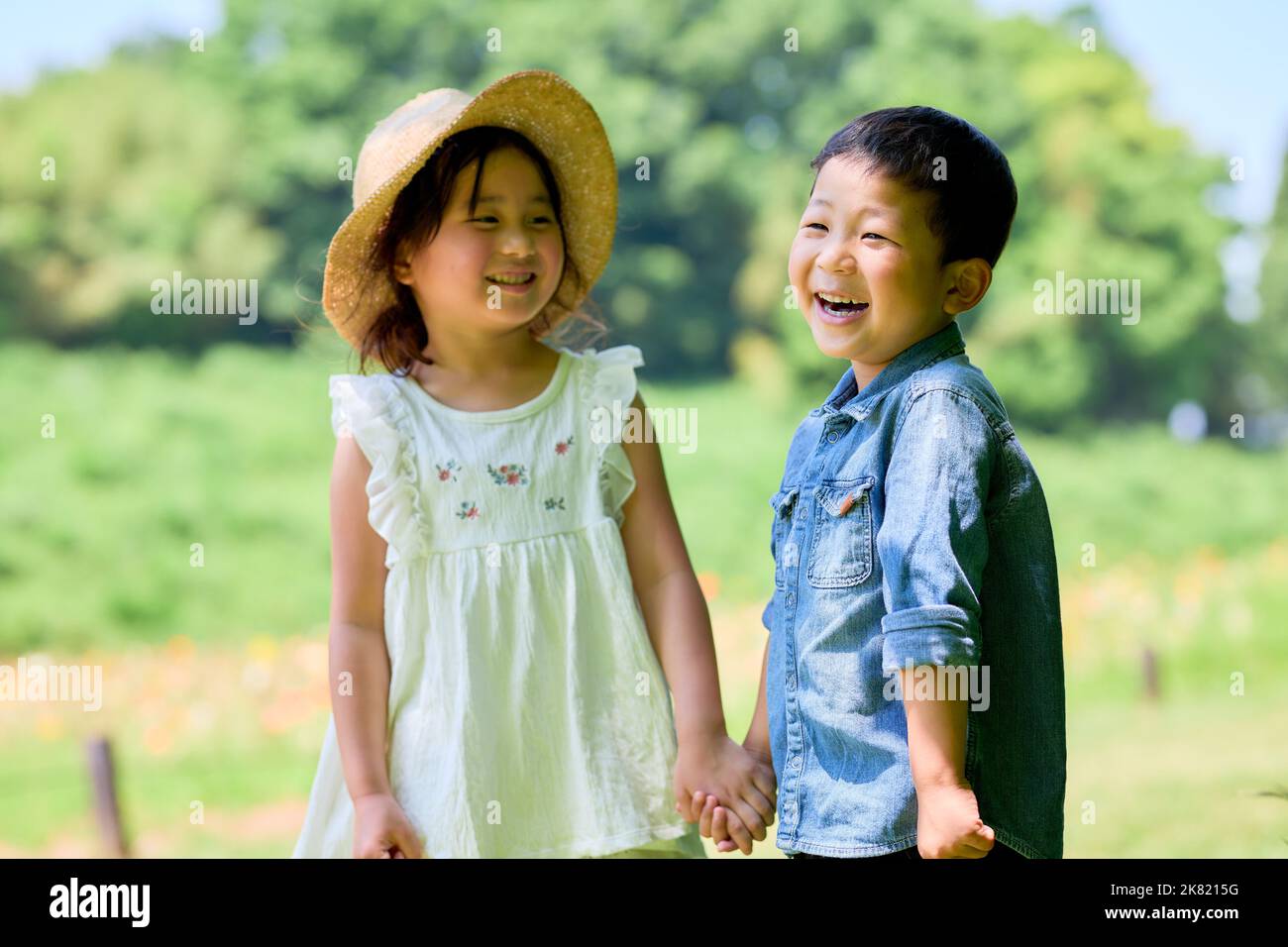 Japanese kids in a city park Stock Photo - Alamy