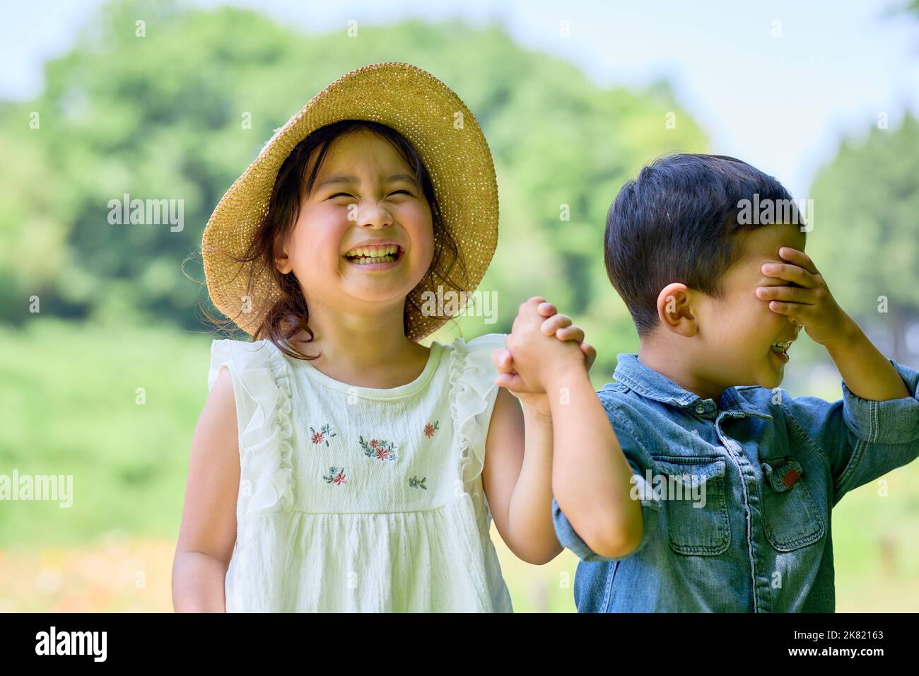 Japanese kids in a city park Stock Photo - Alamy
