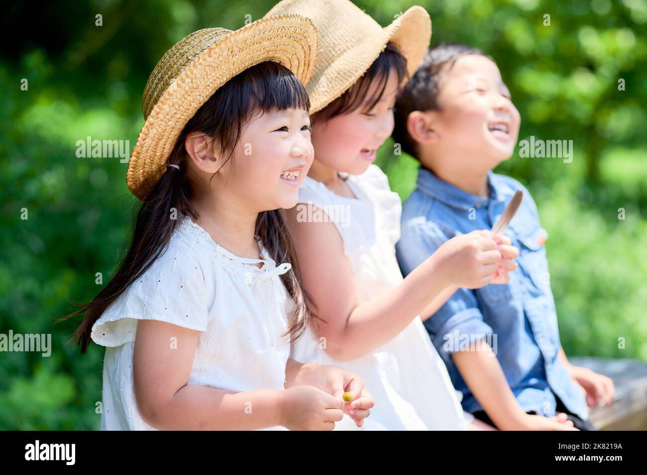 Japanese kids in a city park Stock Photo - Alamy