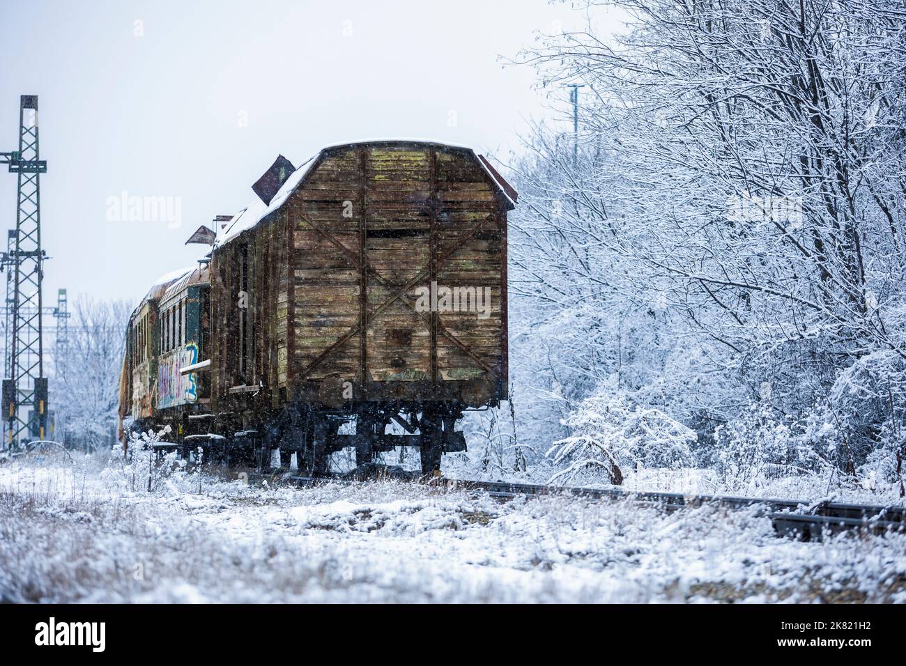 Abandoned vintage train wagon on railway in winter Stock Photo - Alamy