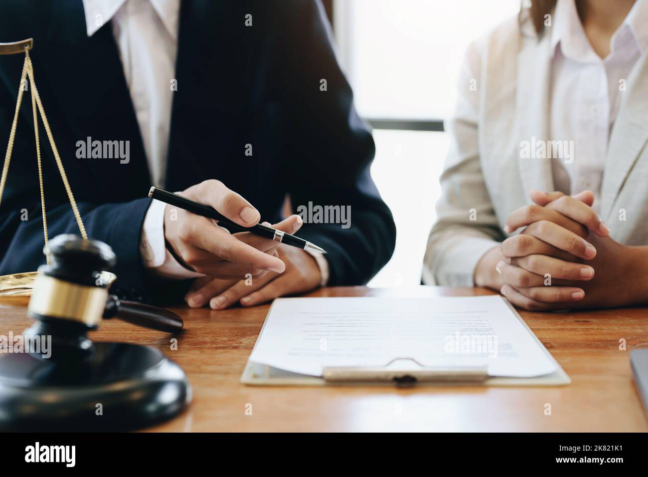 The client is consulting with a lawyer on legal matters Stock Photo - Alamy