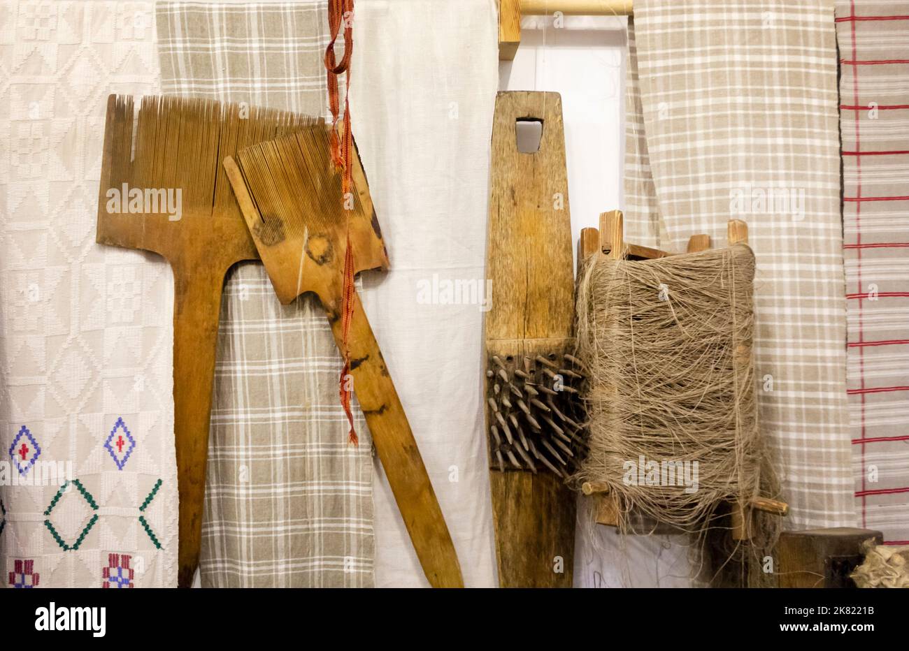 Manual processing of flax. Wooden fixture with a handle. Weaving ...