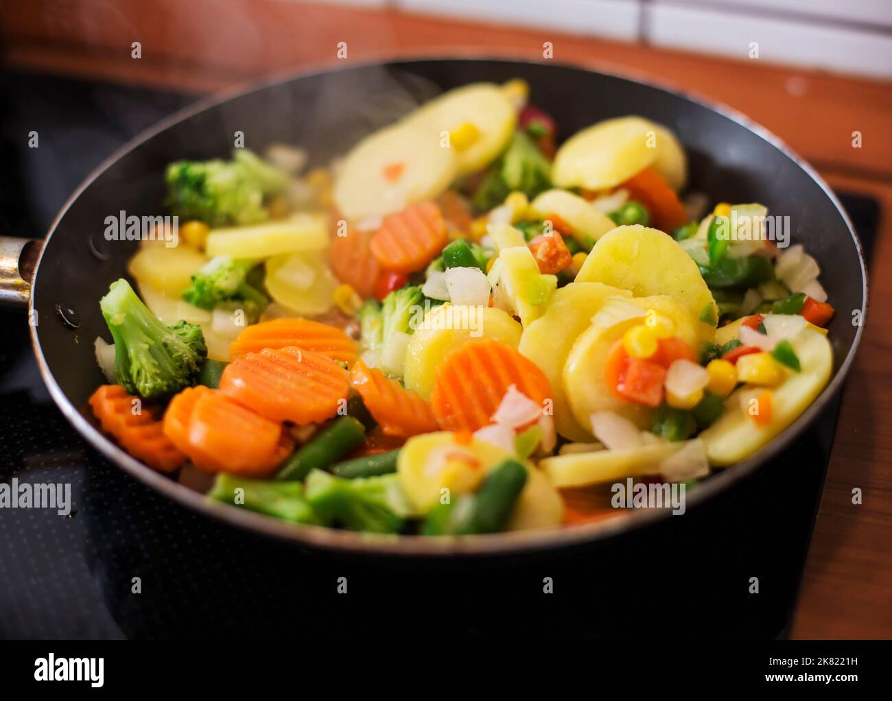 Mixed vegetables boiled in pan Stock Photo - Alamy