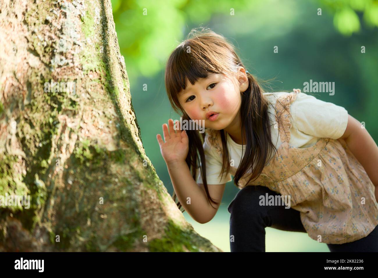Japanese kid in a city park Stock Photo - Alamy