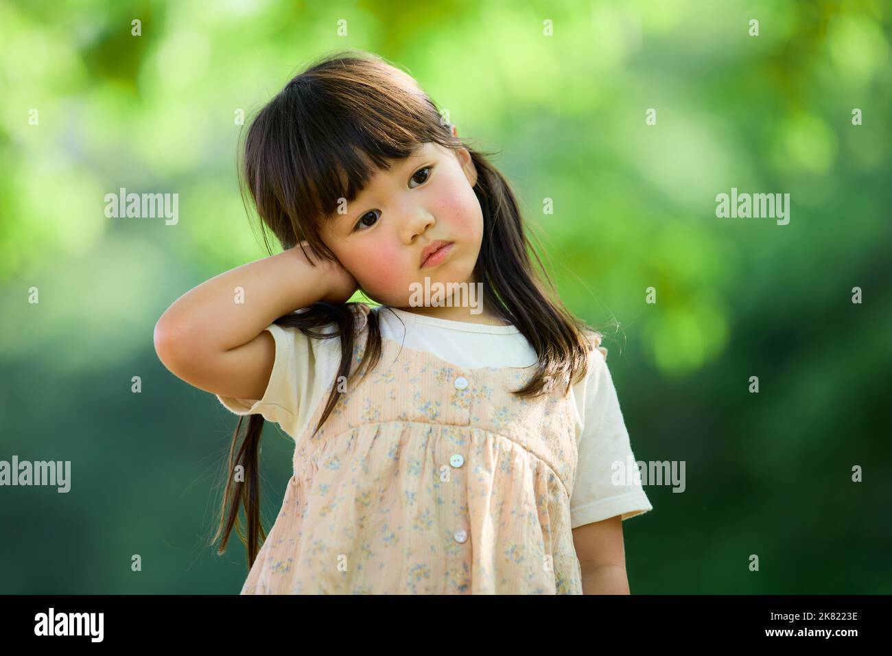 Japanese kid in a city park Stock Photo - Alamy